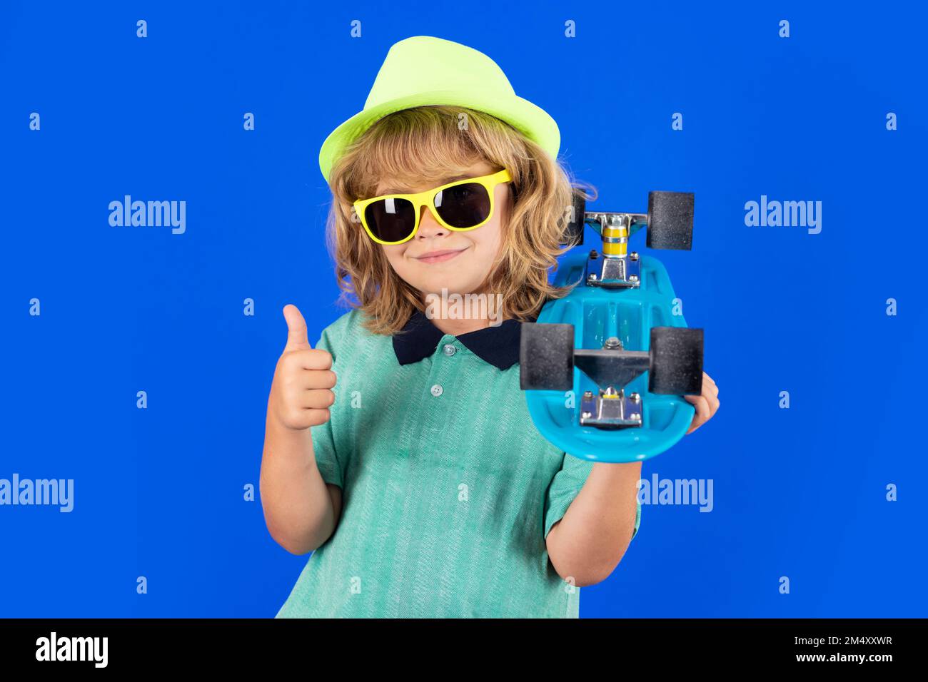 Kid with skateboard. Child hold skate board. Healthy sport and activity ...