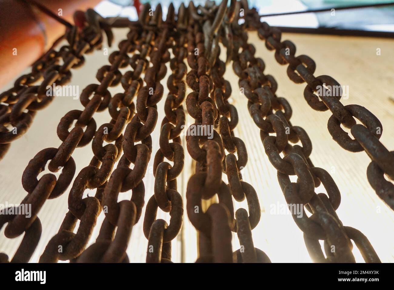 rusty chain bars, lower angle Stock Photo - Alamy