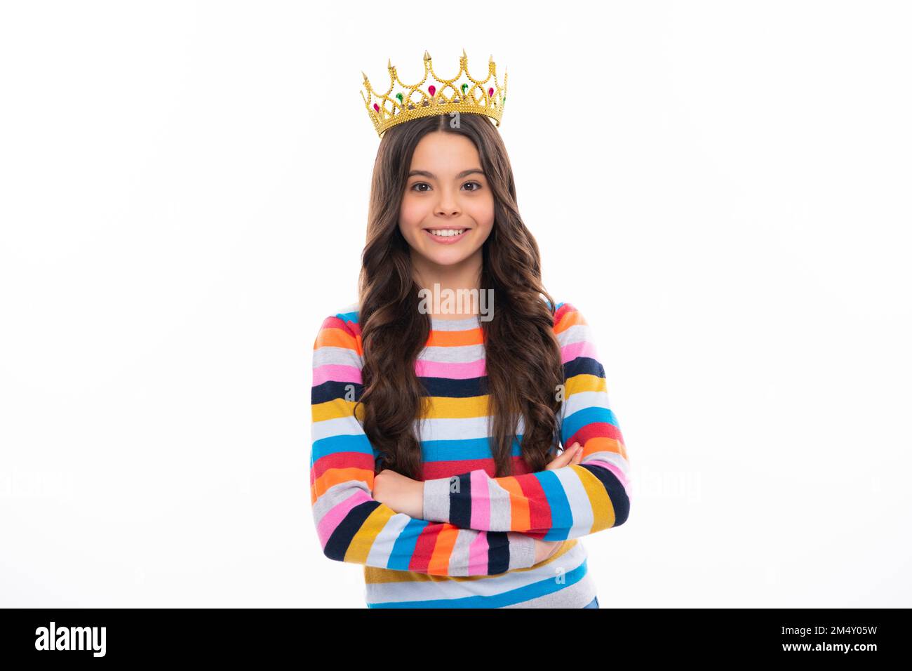 Little queen wearing golden crown. Teenage girl princess holding crown ...