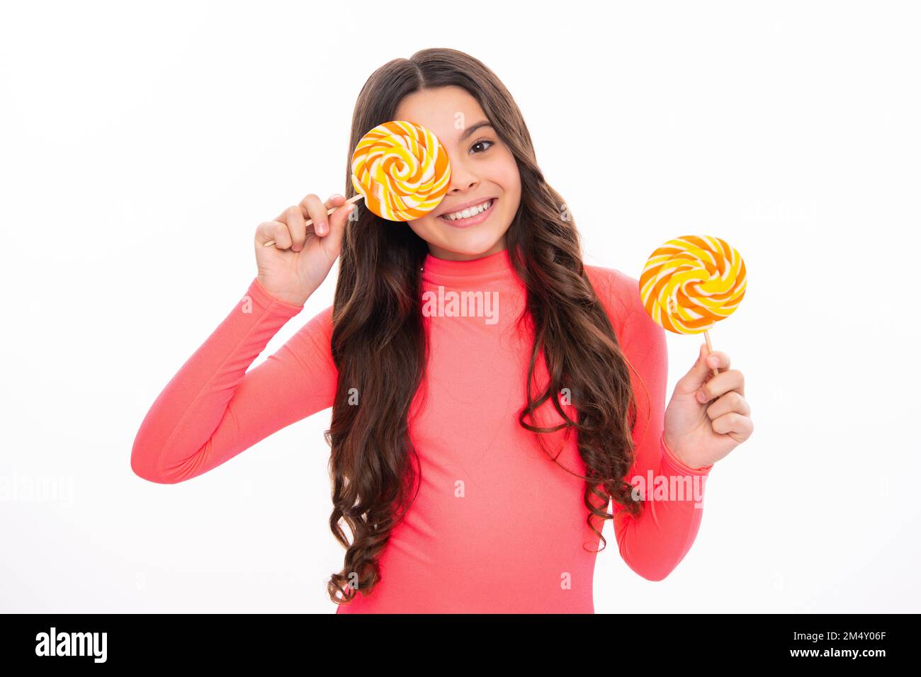 Funny child with lollipop over white isolated background. Sweet ...