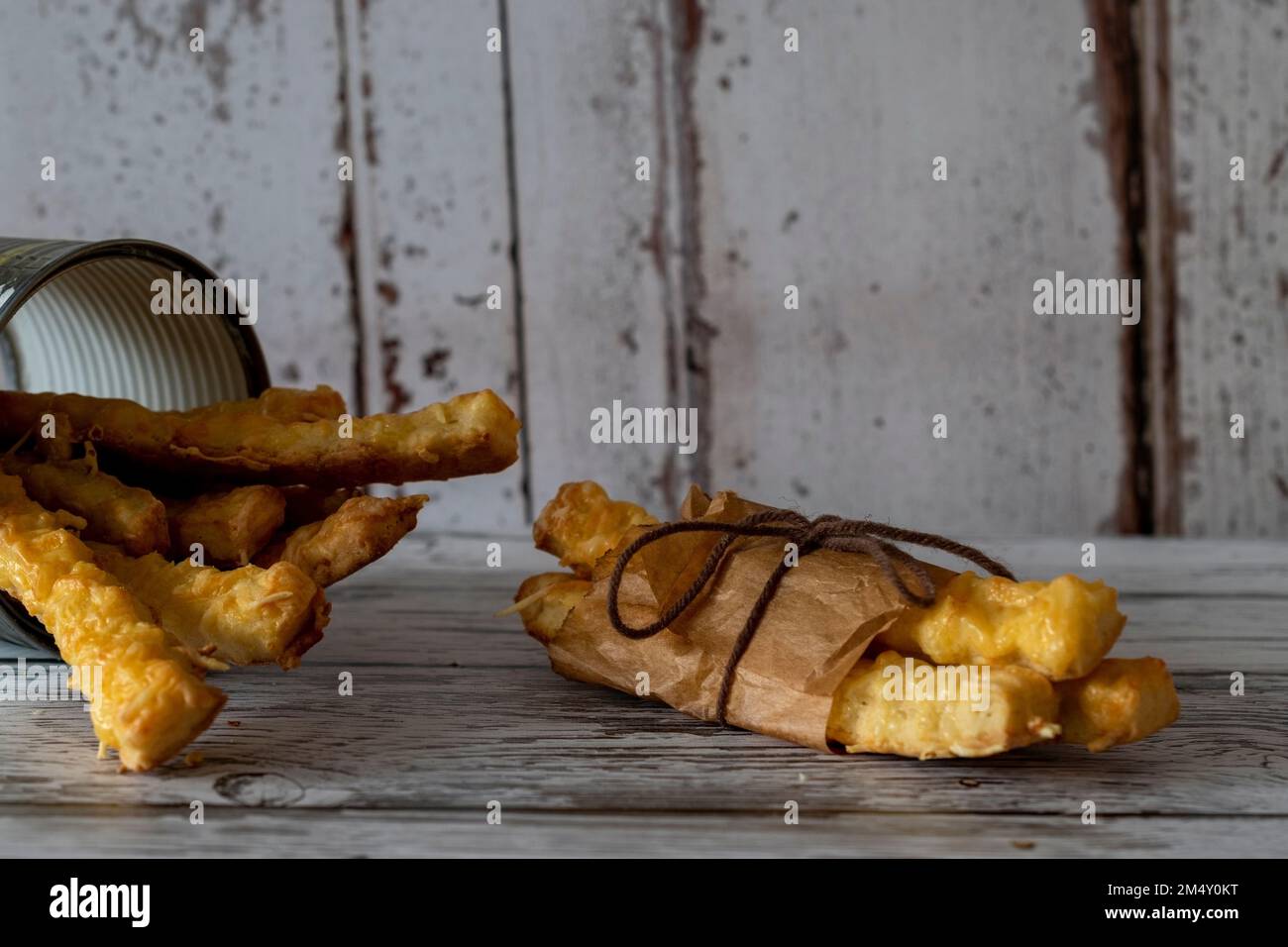 Cheesy stick on a table Stock Photo - Alamy