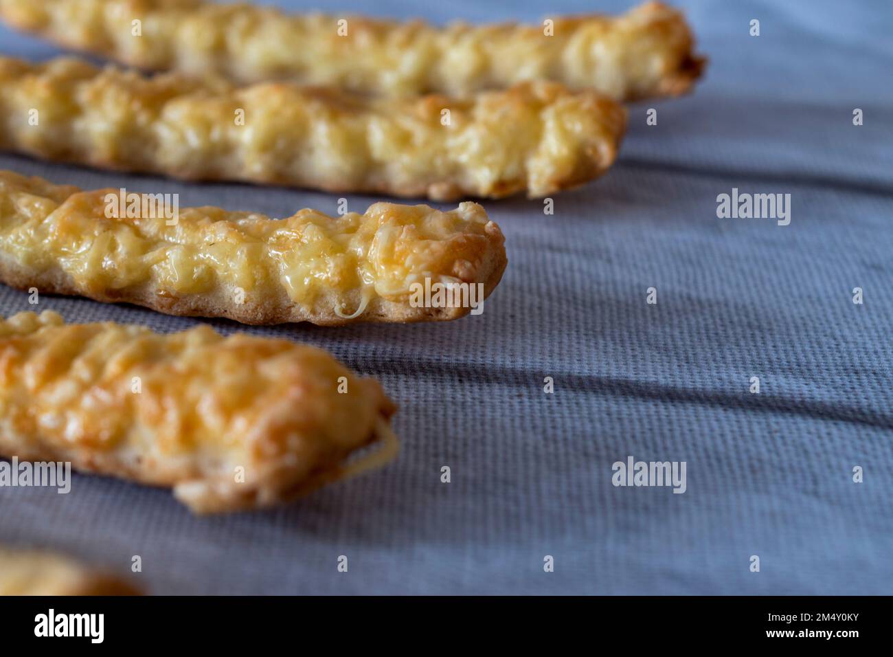 Cheesy stick on a table Stock Photo - Alamy