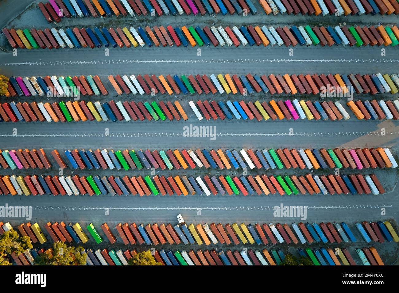 Aerial view of large cargo container yard with rows of freight ...