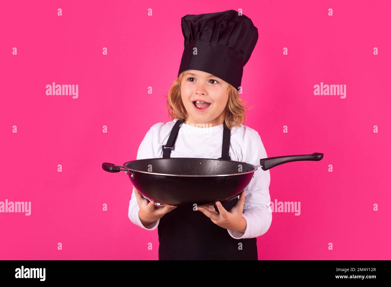 Kid chef cook cookery with pan. Child chef cook, studio portrait. Kids ...