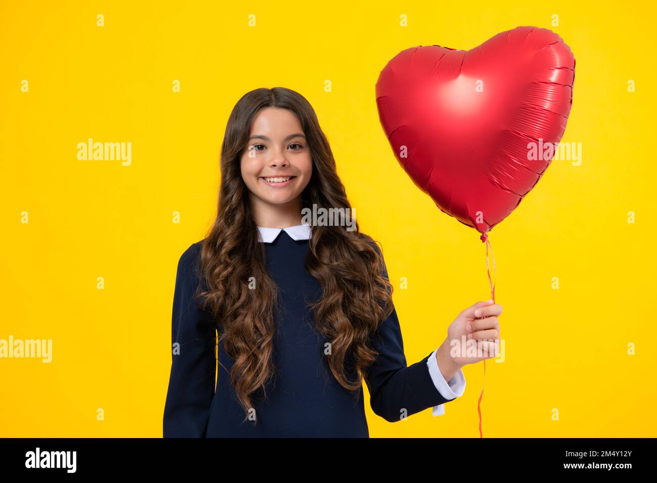 Lovely child girl 12, 13, 14 years old with shape heart balloon, love ...