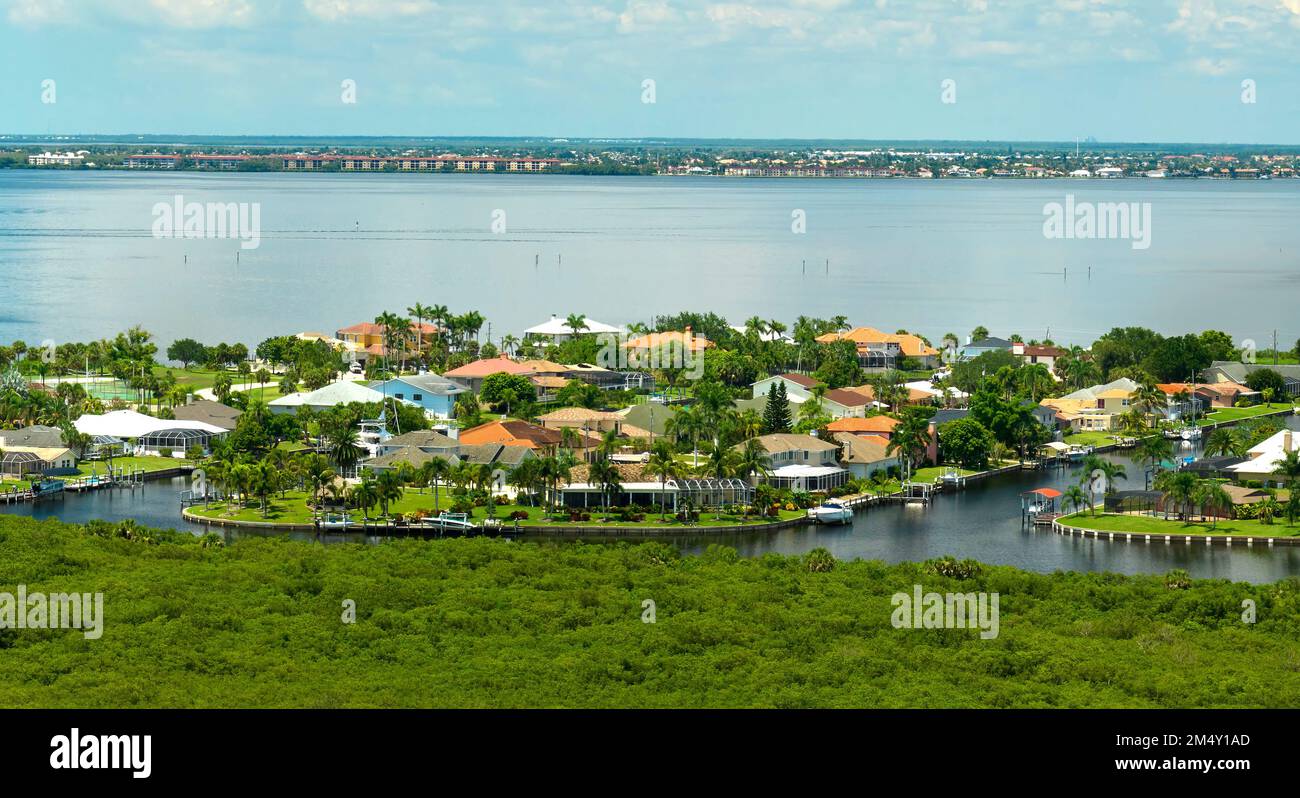 Aerial view of rural private houses in remote suburbs located near ...