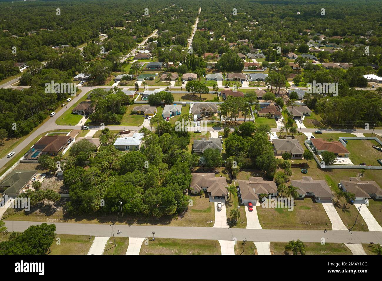 Aerial view of small town America suburban landscape with private homes ...