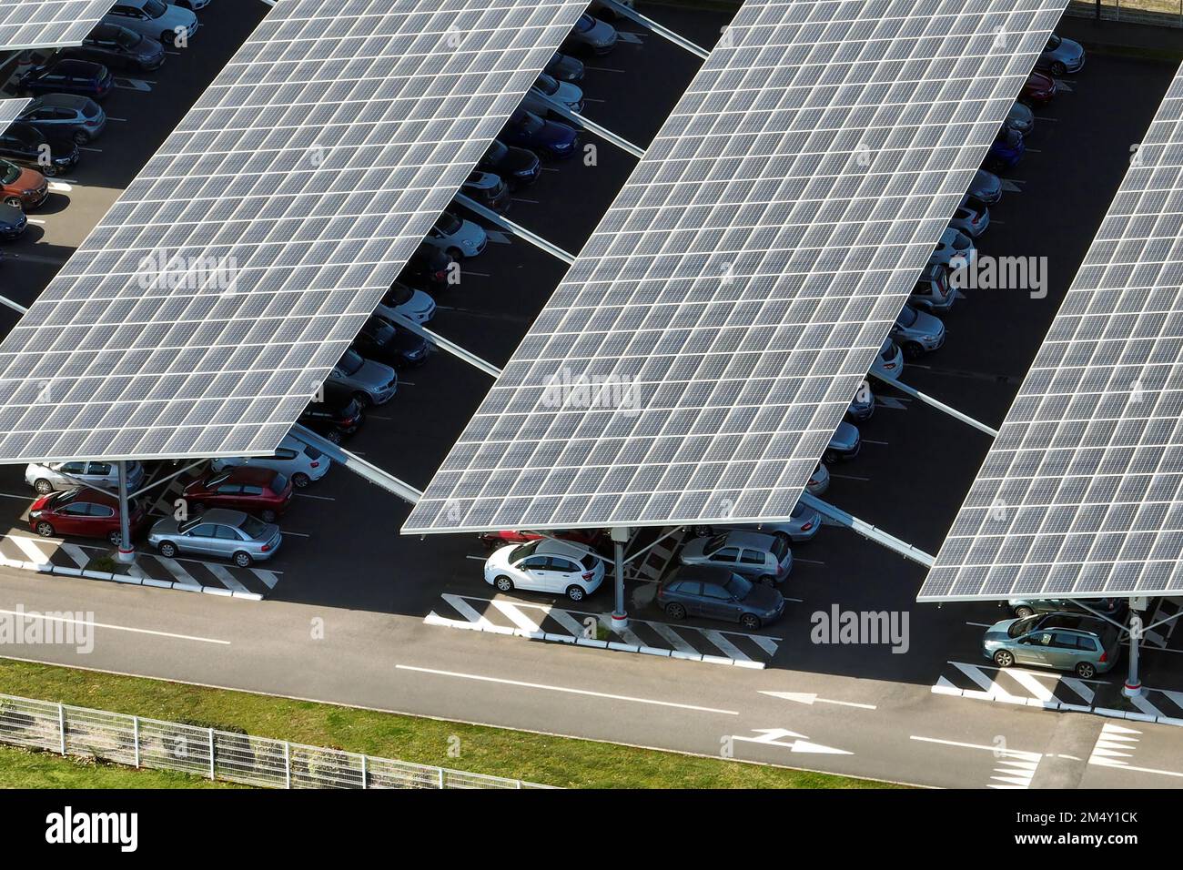 Aerial view of solar panels installed as shade roof over parking lot ...