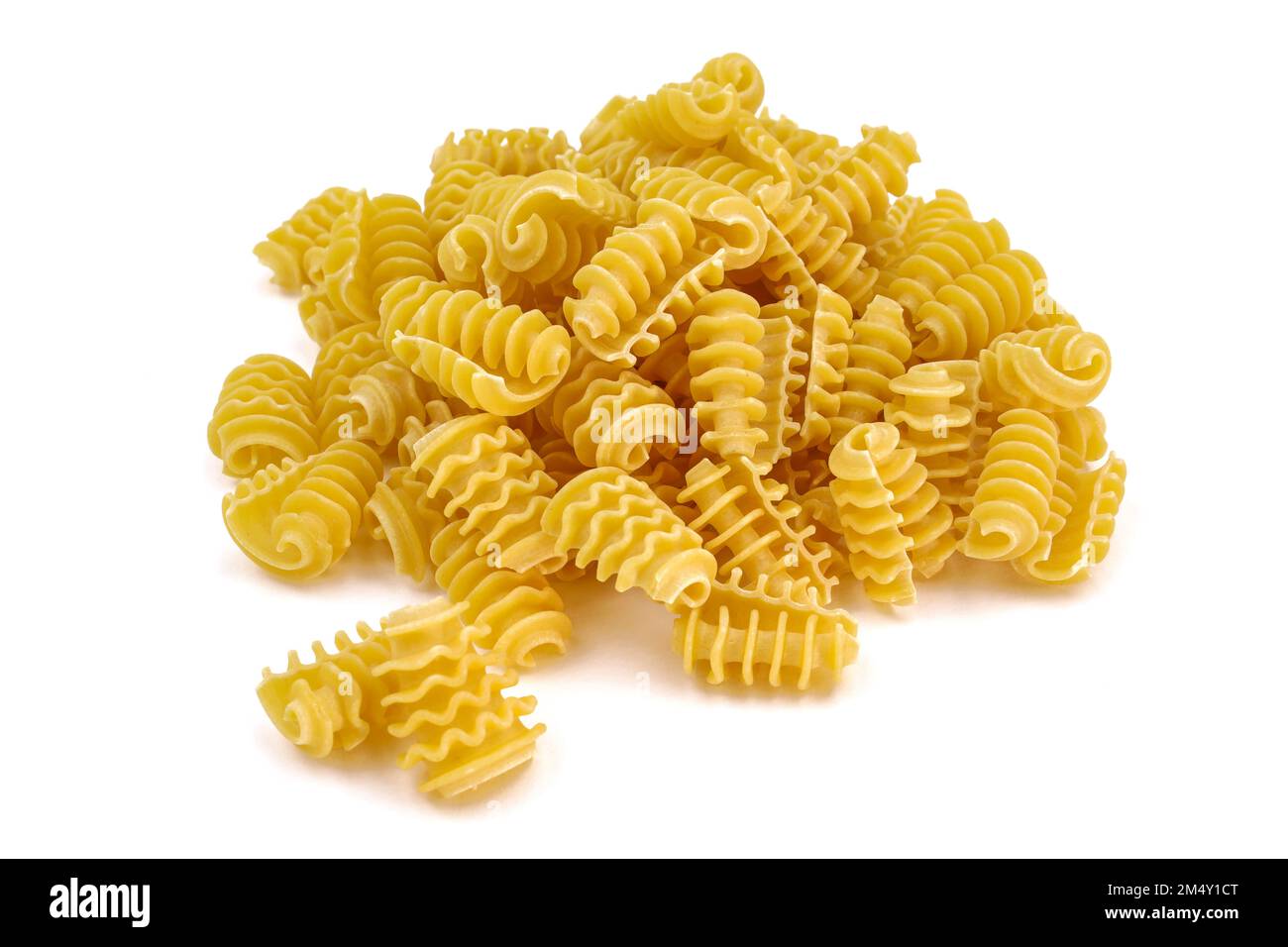Spiral pasta on a white background. Dry curly pasta close-up. Pasta ...
