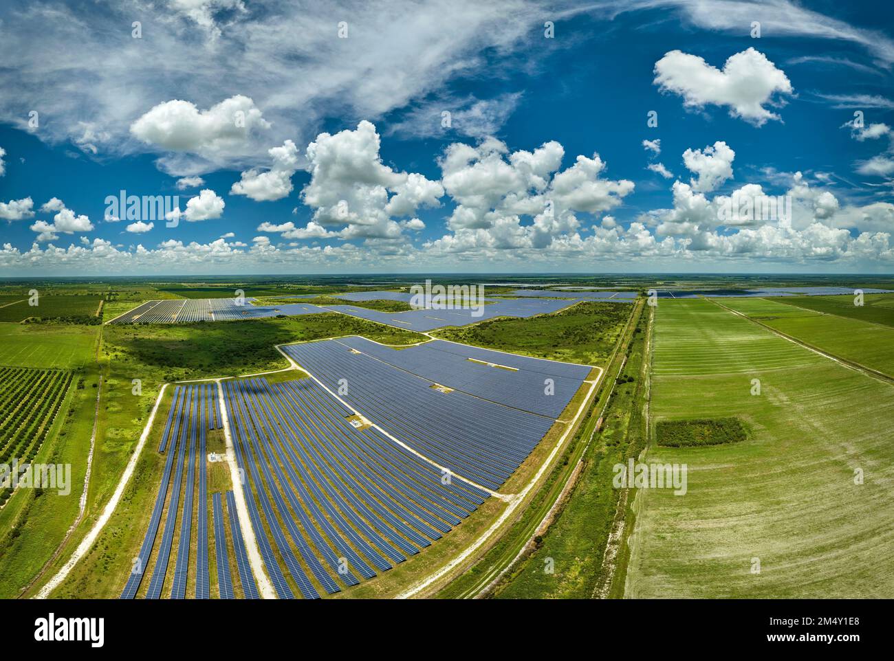 Aerial view of sustainable electric power plant between agricultural ...