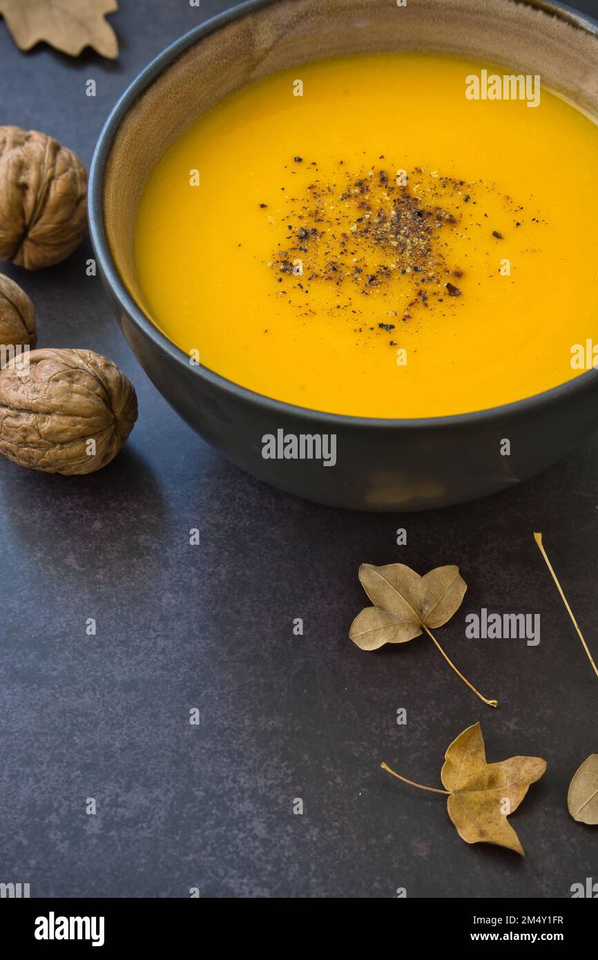 Autumnal composition with dried leaves and delicious creamy homemade ...