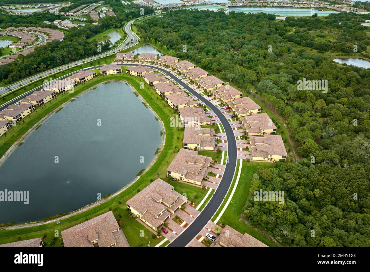 Aerial view of tightly packed homes in Florida closed living clubs with ...