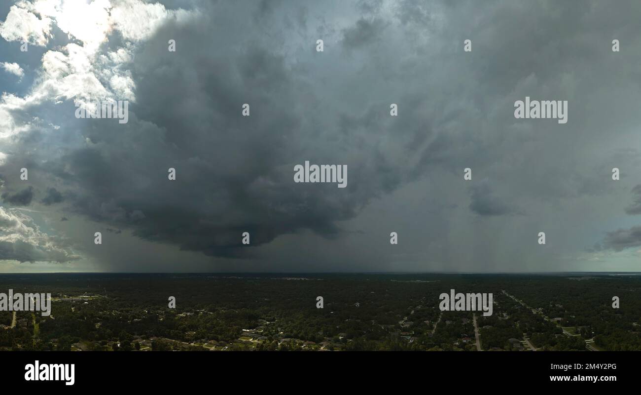 Landscape of dark ominous clouds forming on stormy sky during heavy ...