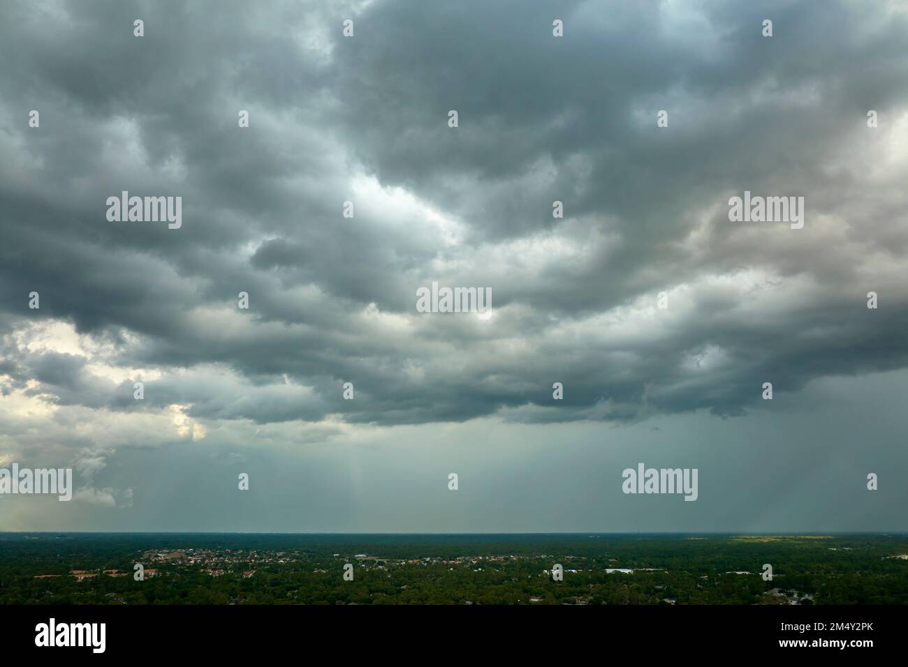 Landscape of dark ominous clouds forming on stormy sky before heavy ...