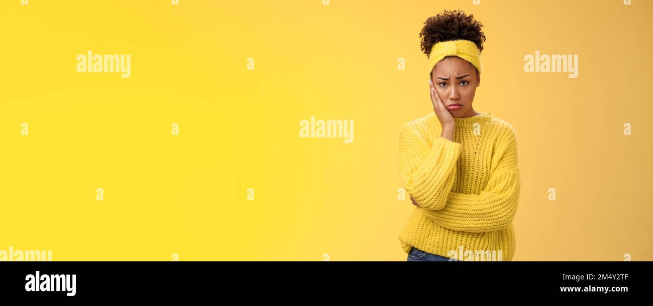 Upset cute gloomy young timid girl offended feel sadness regret touch ...