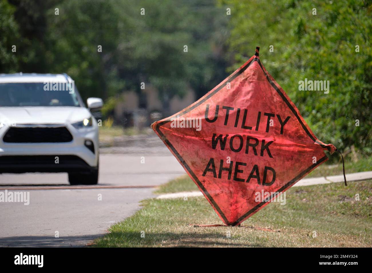 Road work ahead sign on street site as warning to cars about ...