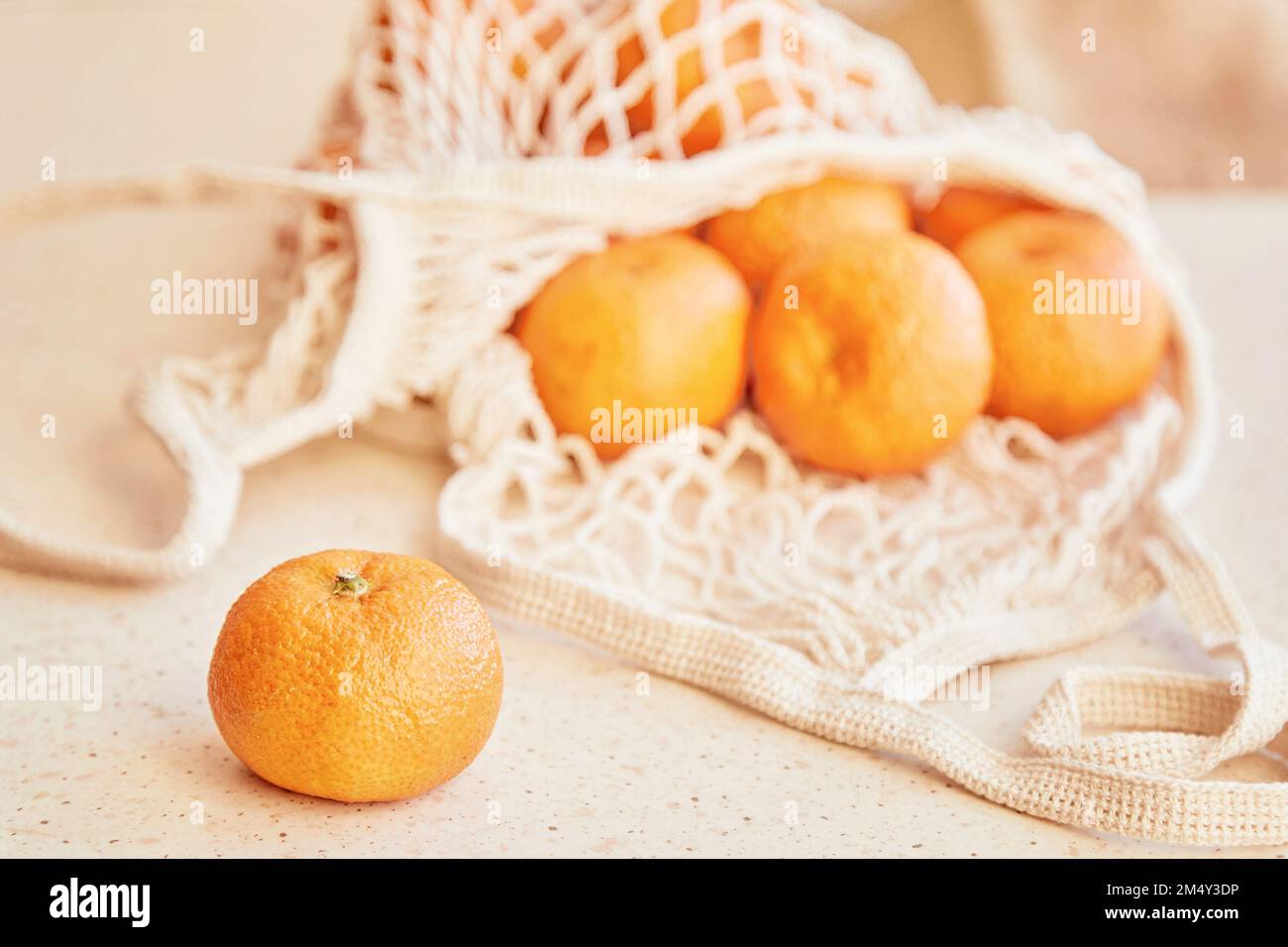 Tangerines in ecological bag background. Vitamin C. Christmas food ...