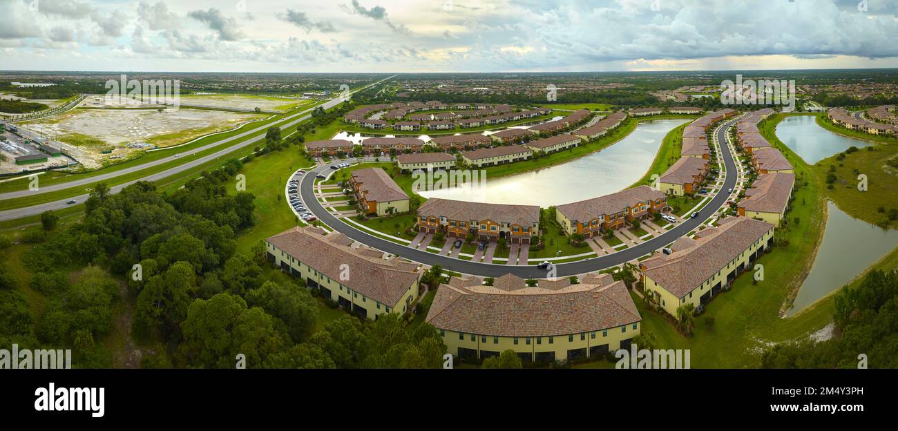 View from above of densely built residential houses in closed living ...