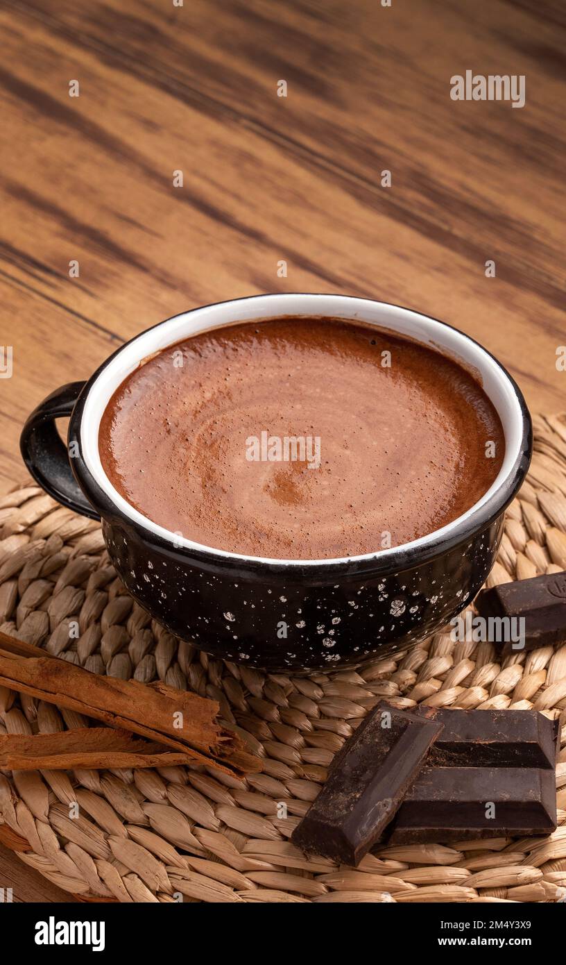 Cup of hot chocolate with cinnamon - Traditional Colombian drink Stock ...