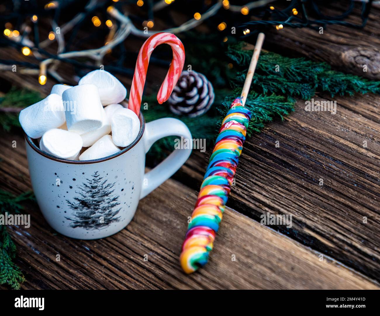 hot Christmas drink with marshmallow on wooden table Stock Photo - Alamy