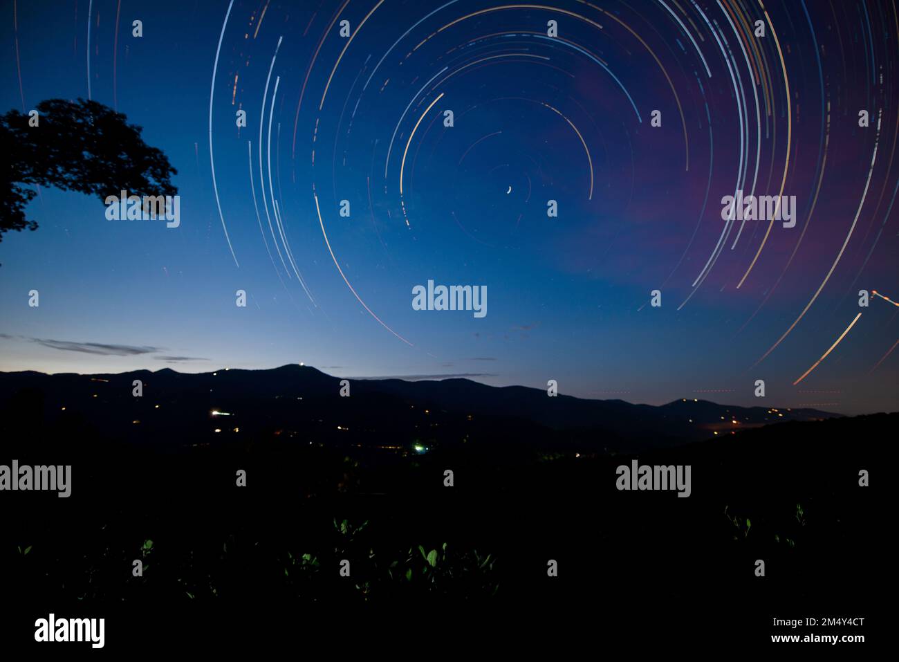 The beautiful view of the night sky with star trails Stock Photo - Alamy