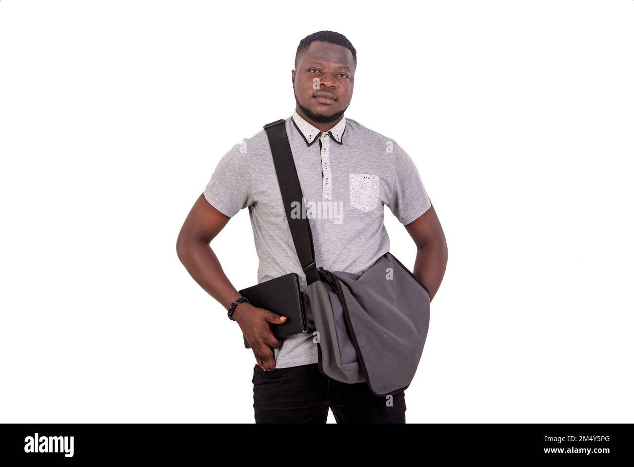 Man carrying bag over shoulder hi-res stock photography and images - Alamy