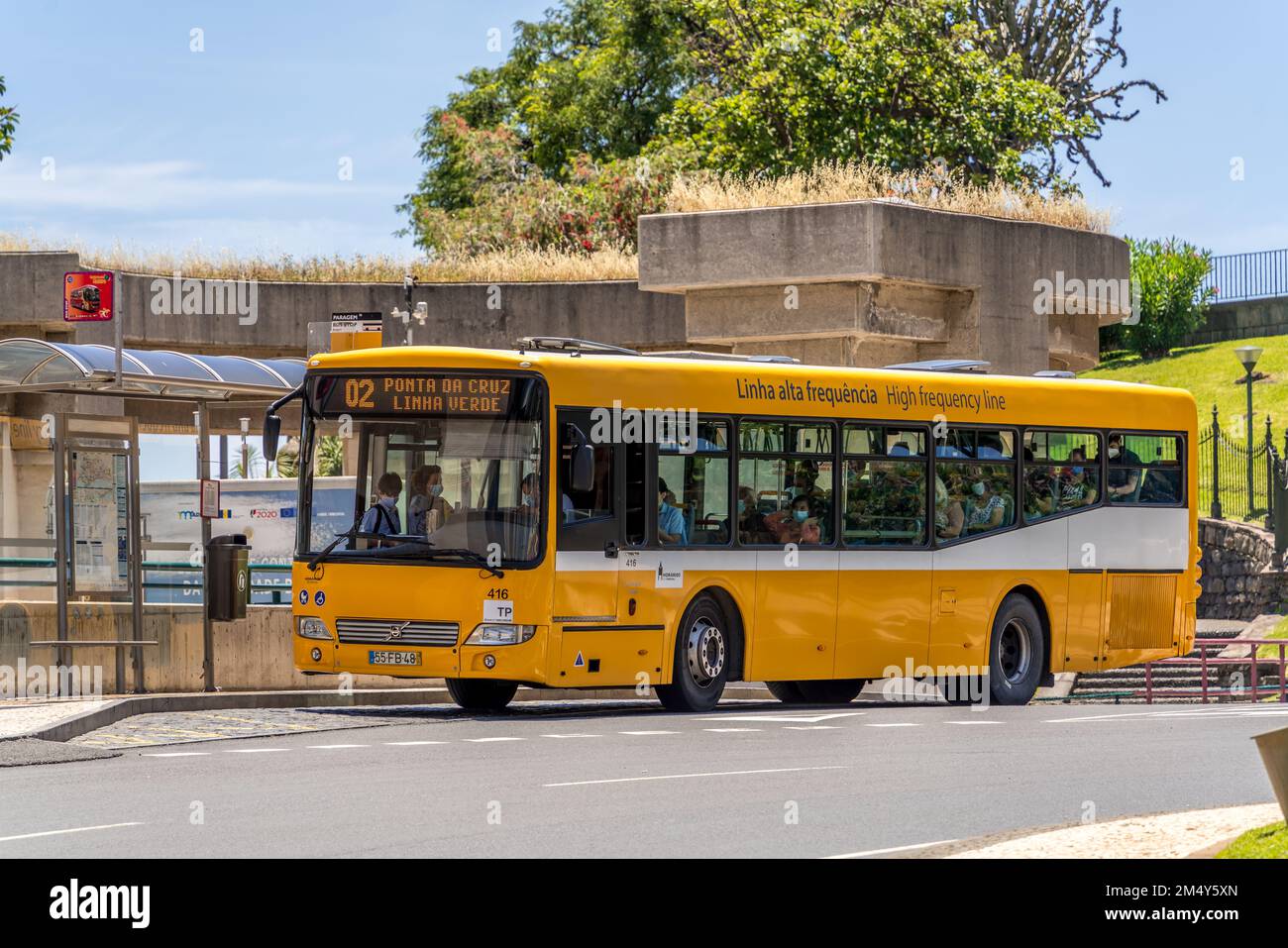A yellow Horarios do Funchal bus at a station in Funchal, Madeira Stock ...