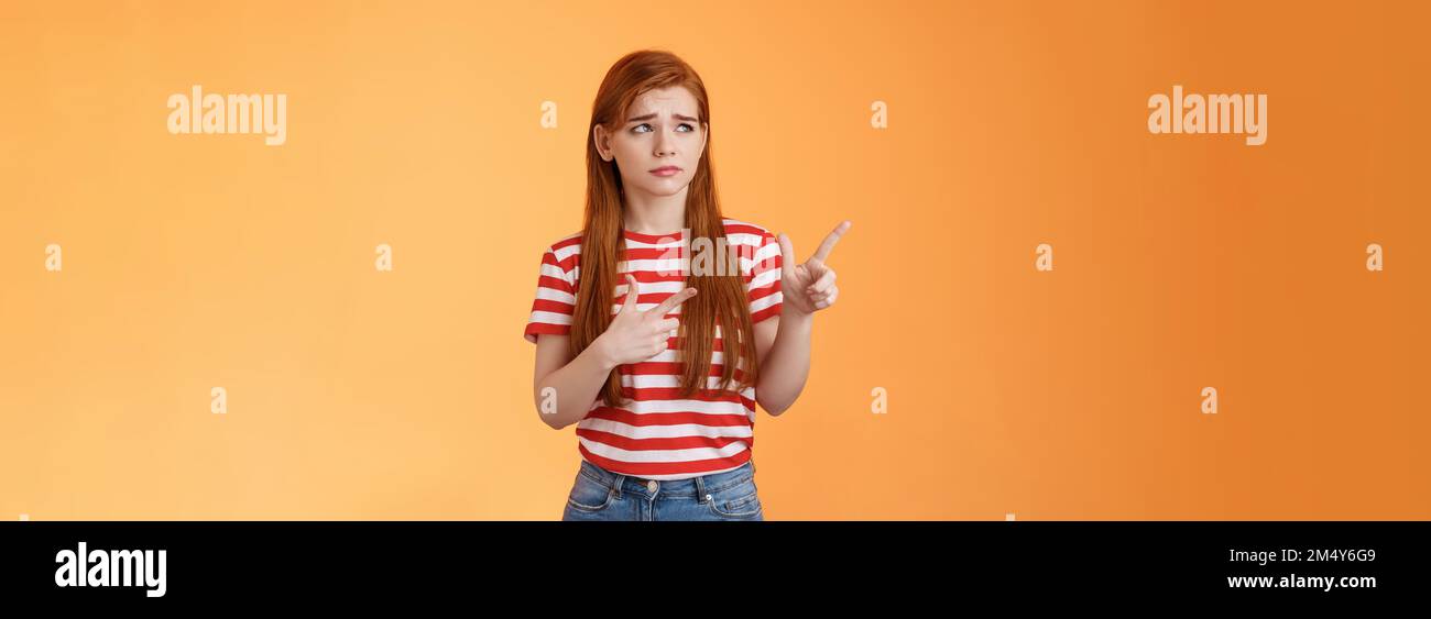 Complicated troubled cute young redhead girl puzzled facing tough ...