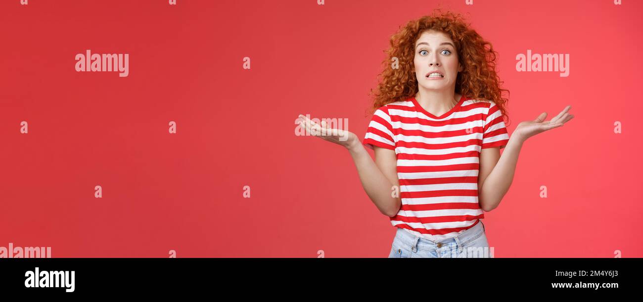 Yikes how should I know. Unaware worried awkward cute redhead curly ...