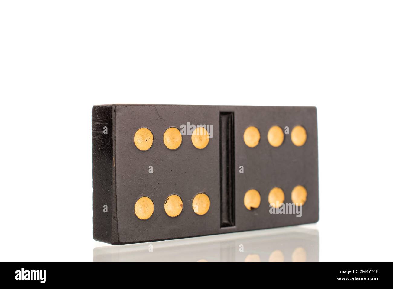 One domino, macro, isolated on white background Stock Photo - Alamy