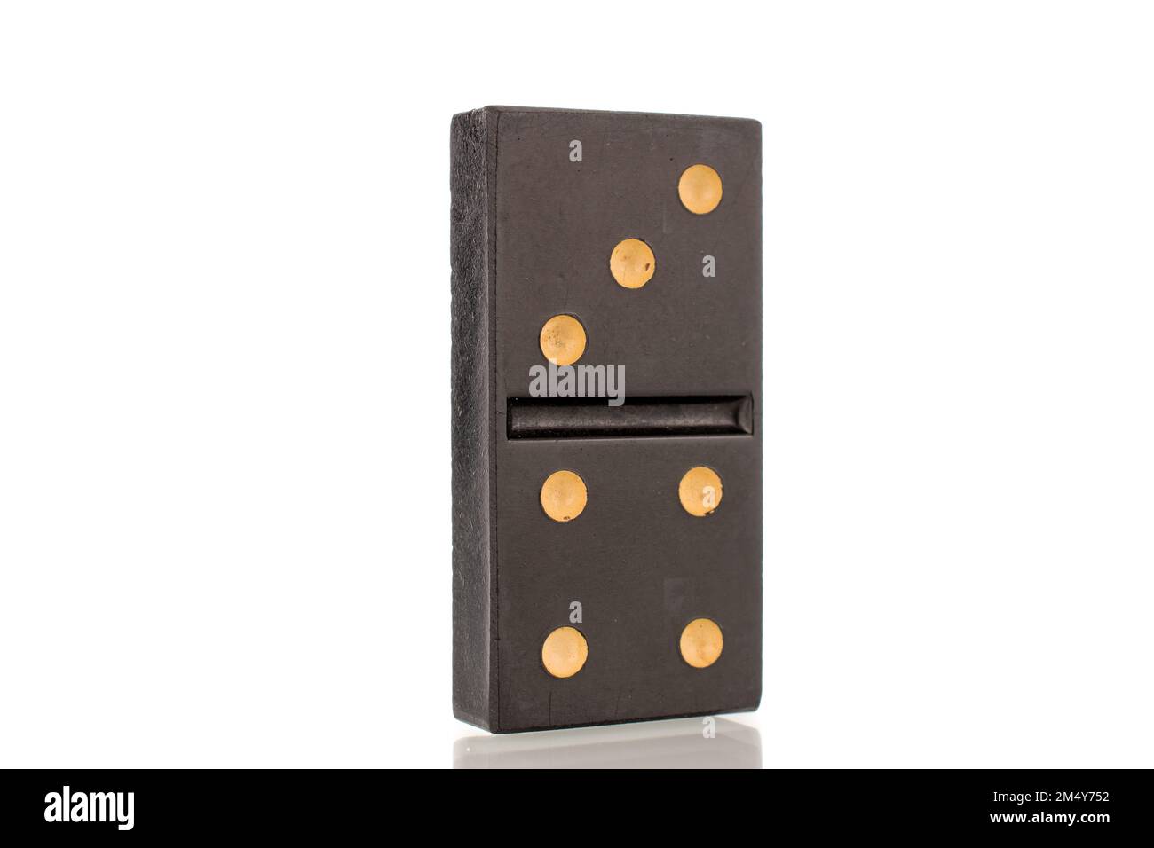 One domino, macro, isolated on white background Stock Photo - Alamy