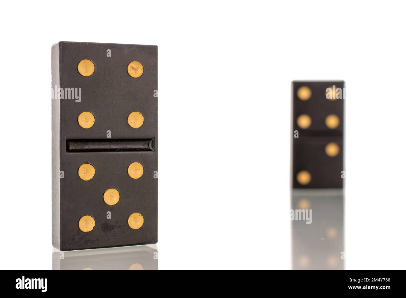 Two dominoes, macro, isolated on white background Stock Photo - Alamy