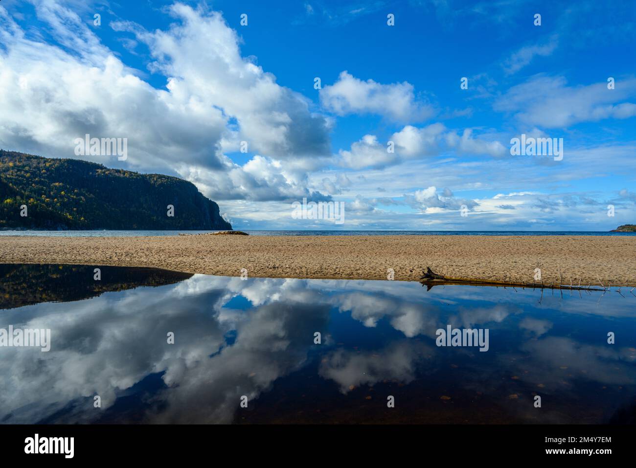 Autumn sky reflections in the Old Woman River, Lake Superior Provincial ...