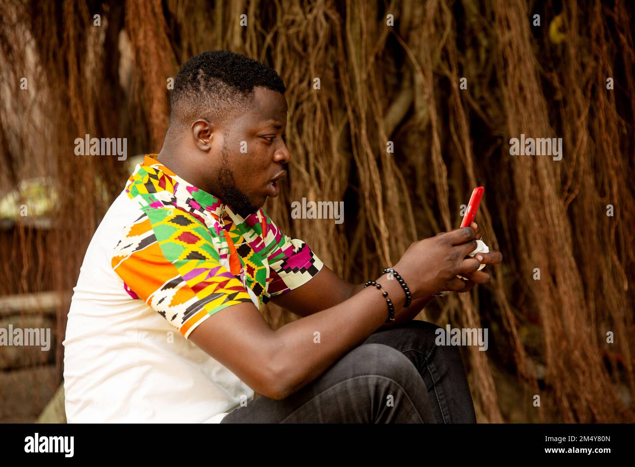Surprised man chatting on hi-res stock photography and images - Alamy