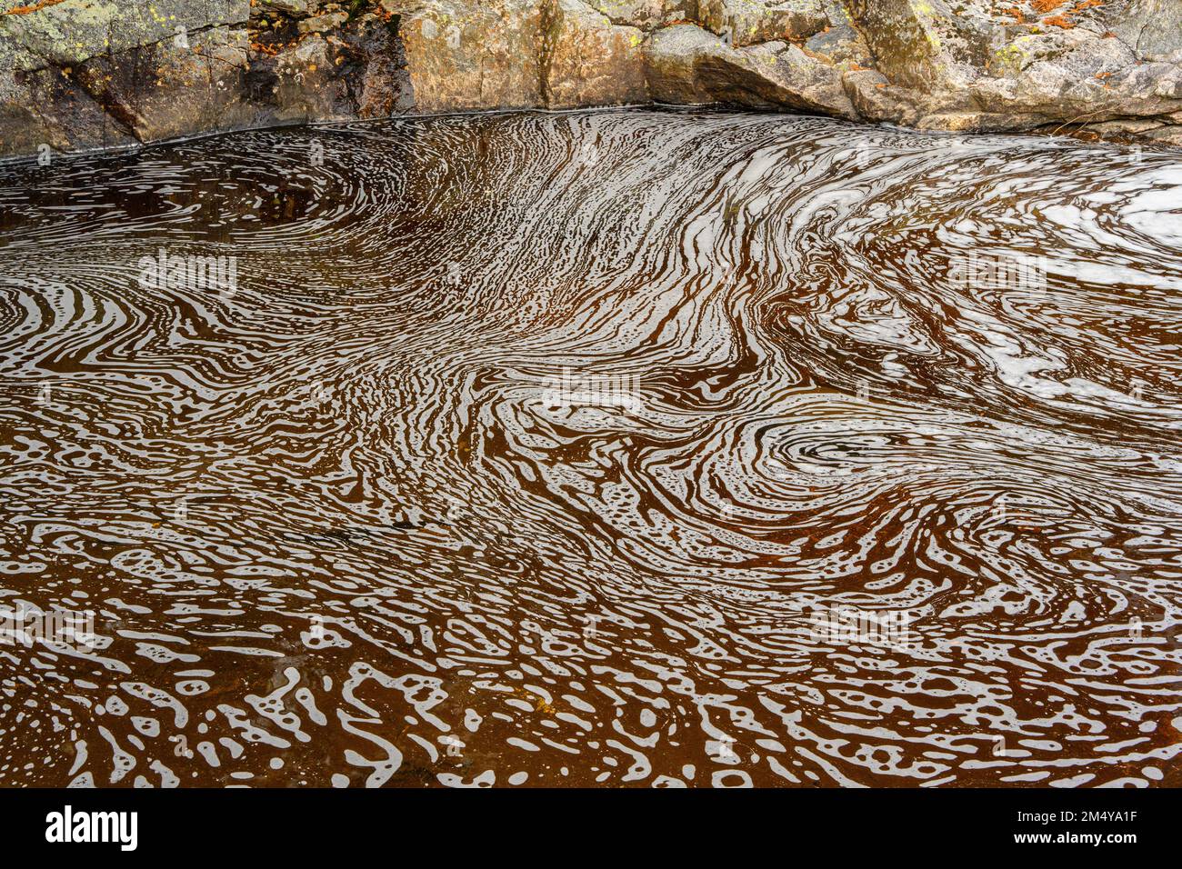 Foam patterns in eddy pool, the Sand River, Lake Superior Provincial ...