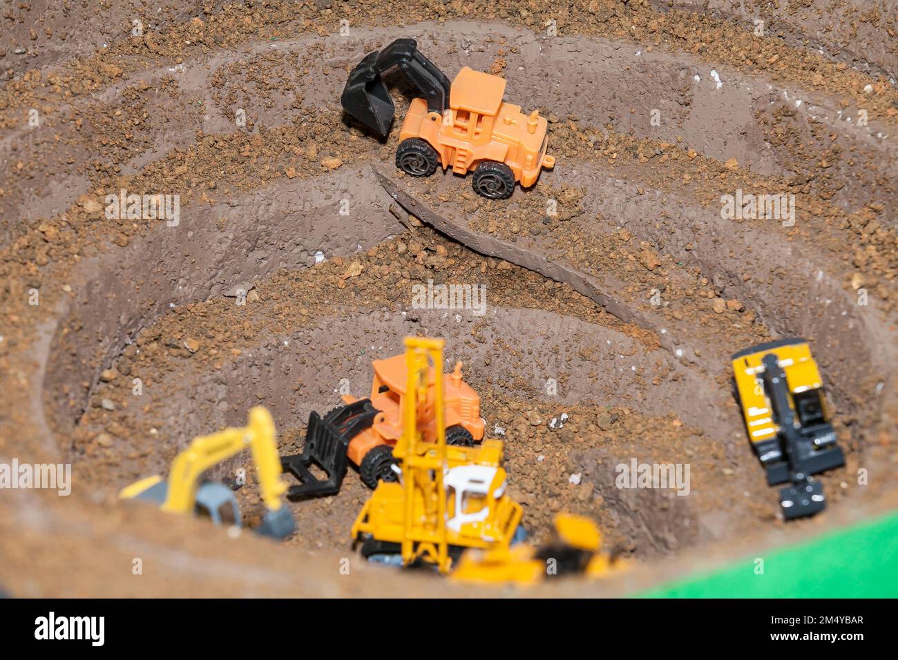Toy Backhoe Set, Working In The Mine, With Selective Focus Stock Photo ...