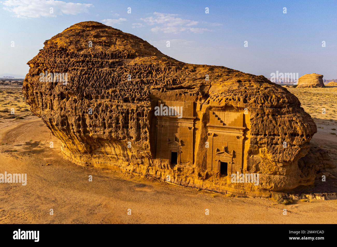 Aerial of the rock tombs, Unesco site Maidain Saleh or Hegra, Al Ula ...