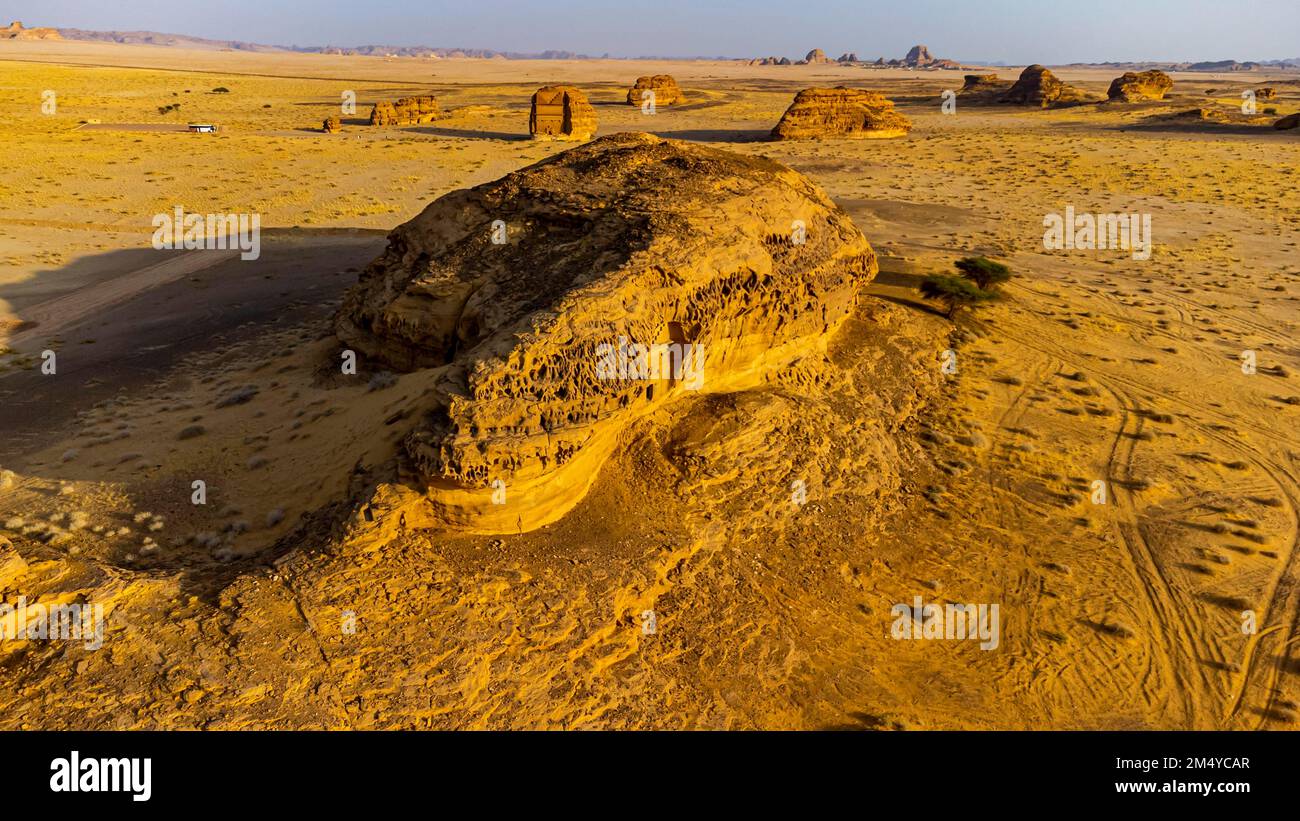 Aerial of the rock tombs, Unesco site Maidain Saleh or Hegra, Al Ula ...