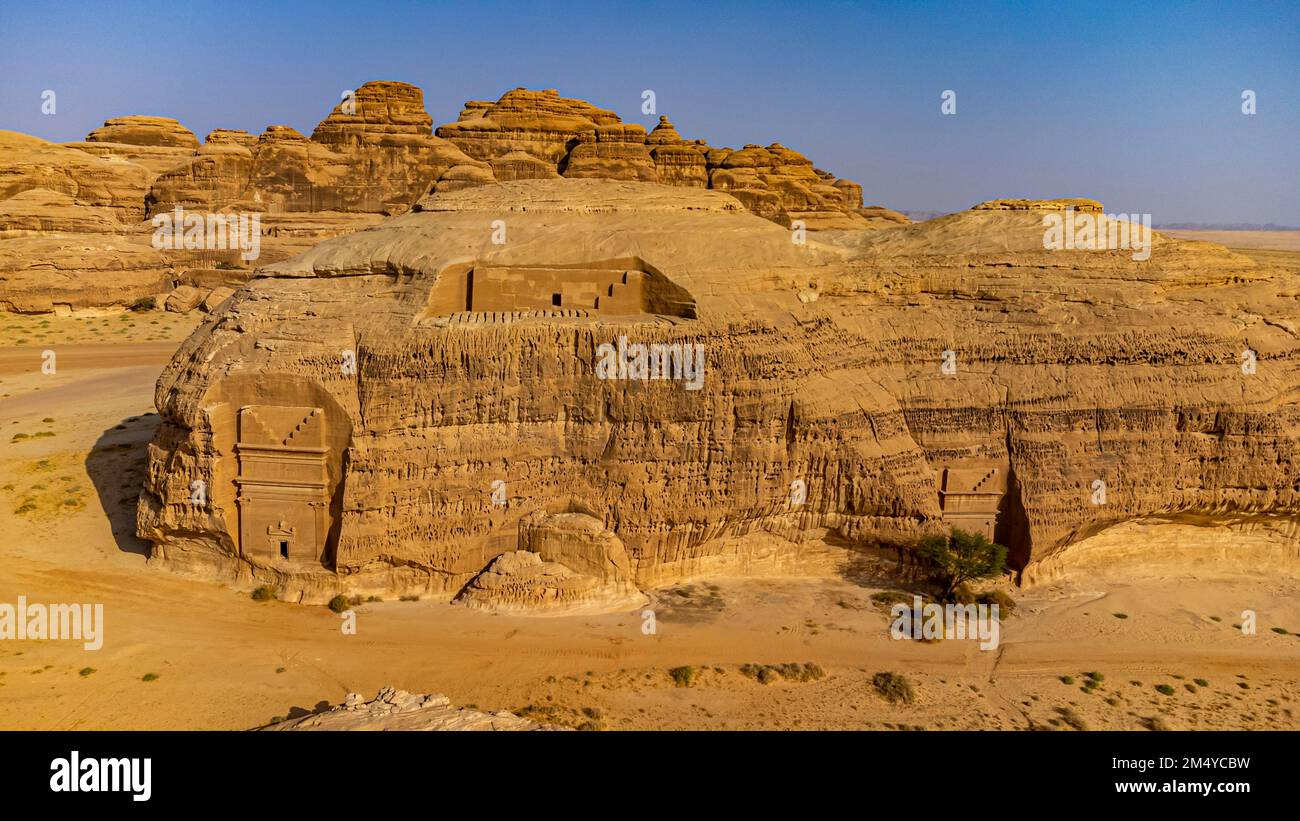 Aerial of the rock tombs, Unesco site Maidain Saleh or Hegra, Al Ula ...