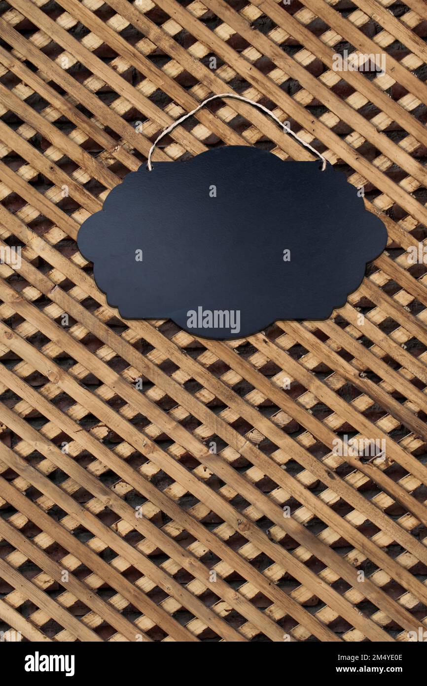 Black Empty Sign Board with string for hanging on wall Stock Photo - Alamy