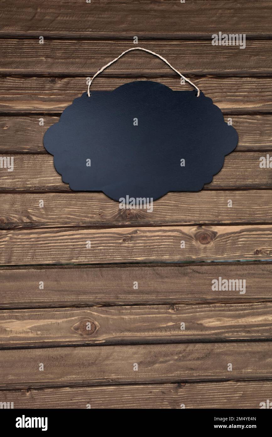 Black Empty Sign Board with string for hanging on wall Stock Photo - Alamy