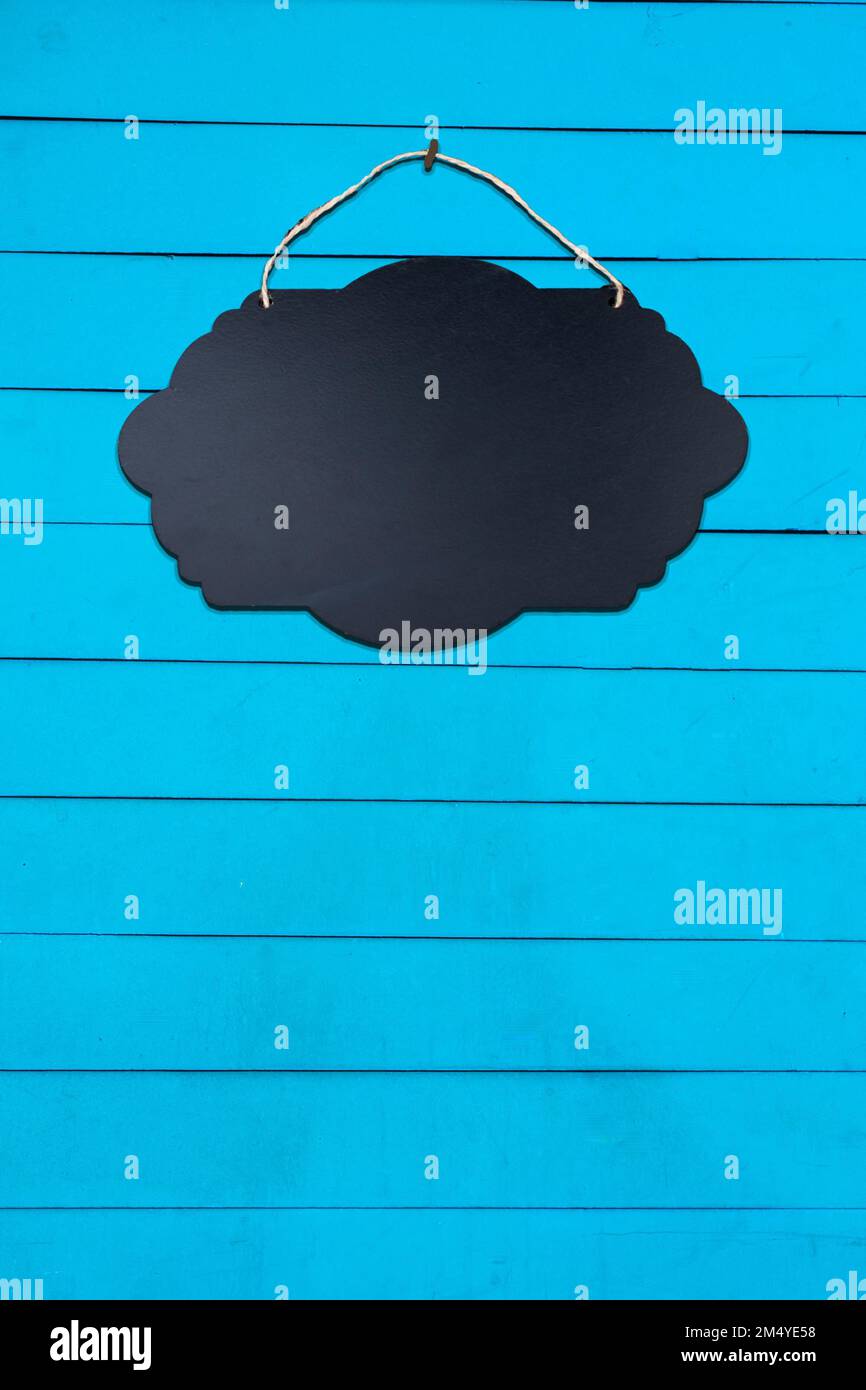 Black Empty Sign Board with string for hanging on wall Stock Photo - Alamy