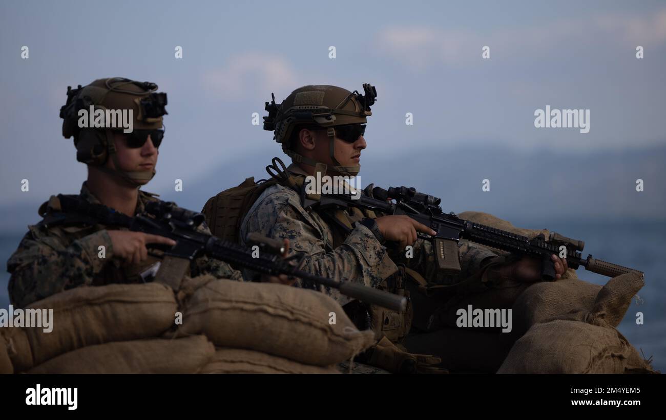 U.S. Marine Corps Sgt. Jonathan DeHart and Sgt. Joshua Jonesia, both ...