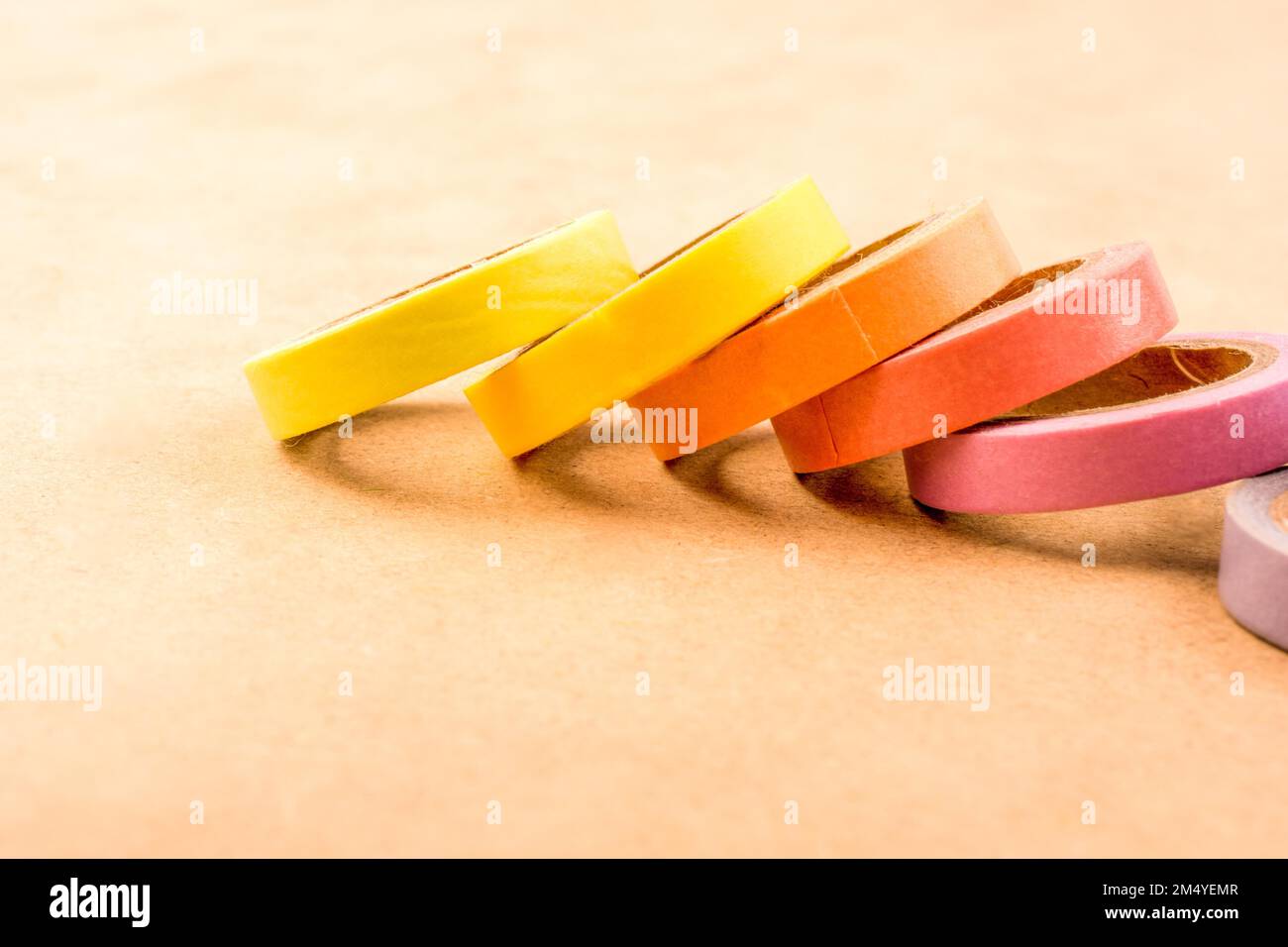 Colorful insulating adhesive tapes on yellow background Stock Photo - Alamy