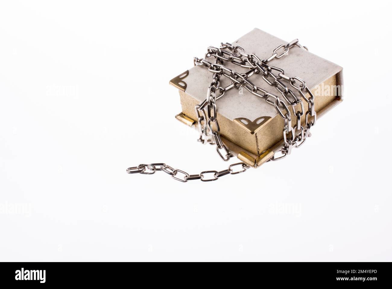 Chained book on white background Stock Photo - Alamy