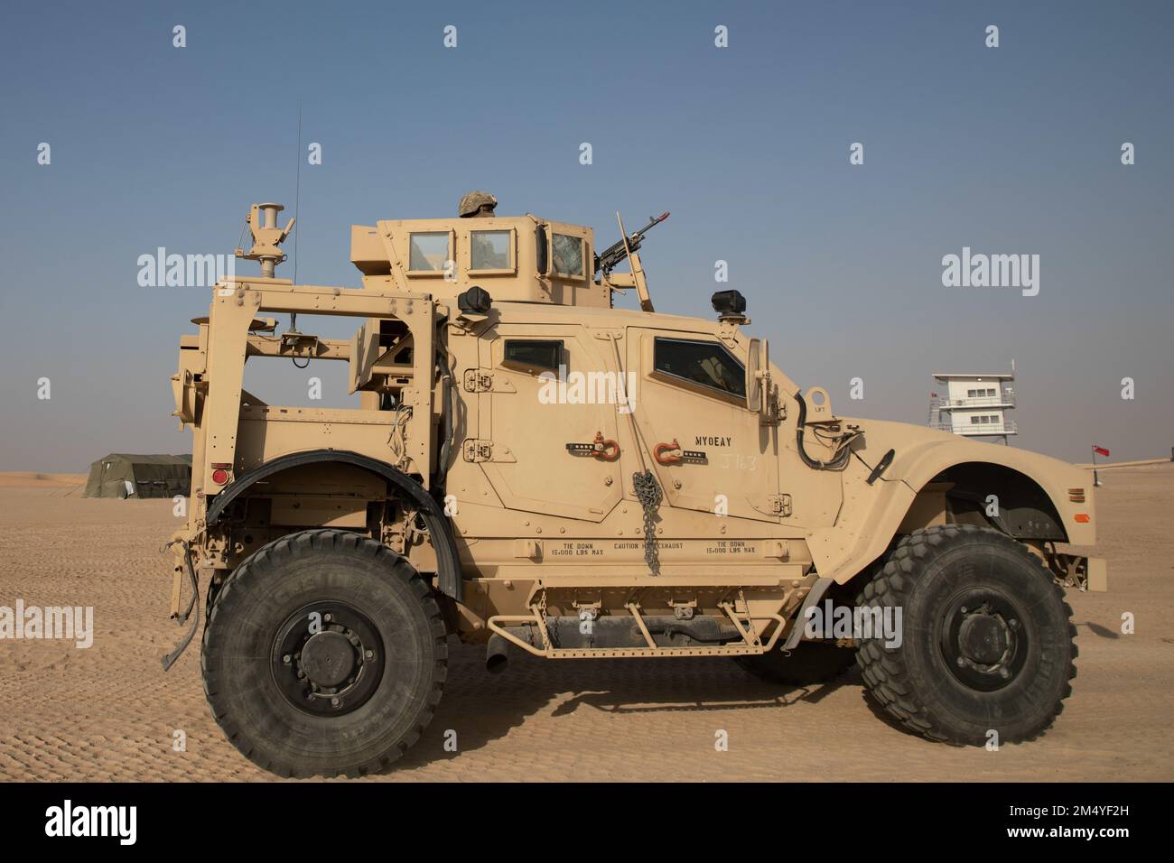 A M-ATV moves towards the exercise starting point while a U.S. Army ...