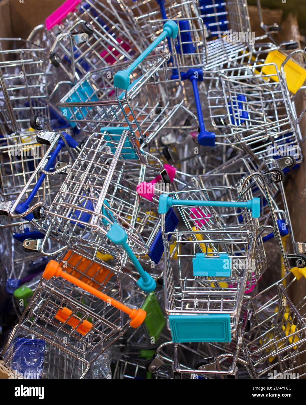 Set of model shopping cart of various colors Stock Photo - Alamy