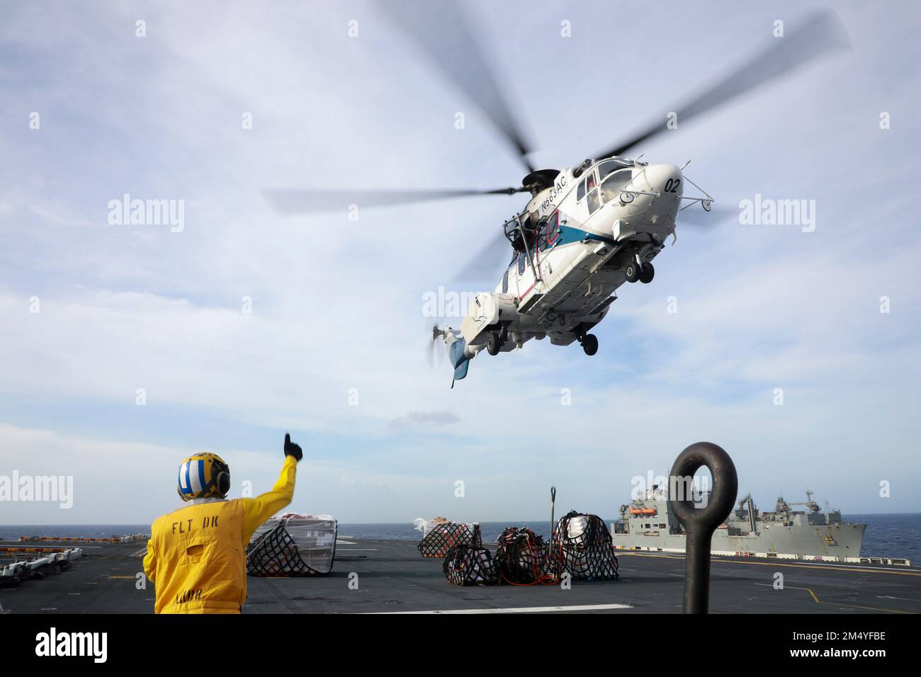 PACIFIC OCEAN (Dec. 4, 2022) - A U.S. Navy Sailor assigned to USS Makin ...