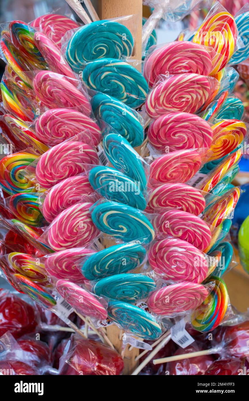 Delicious colorful swirl candy and sweets for kids Stock Photo - Alamy