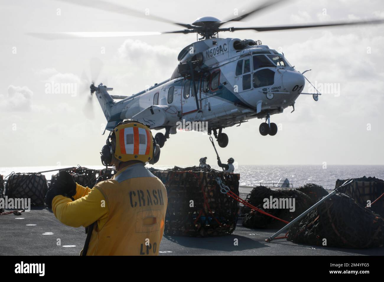 PACIFIC OCEAN (Dec. 4, 2022) - A U.S. Navy Sailor assigned to USS Makin ...